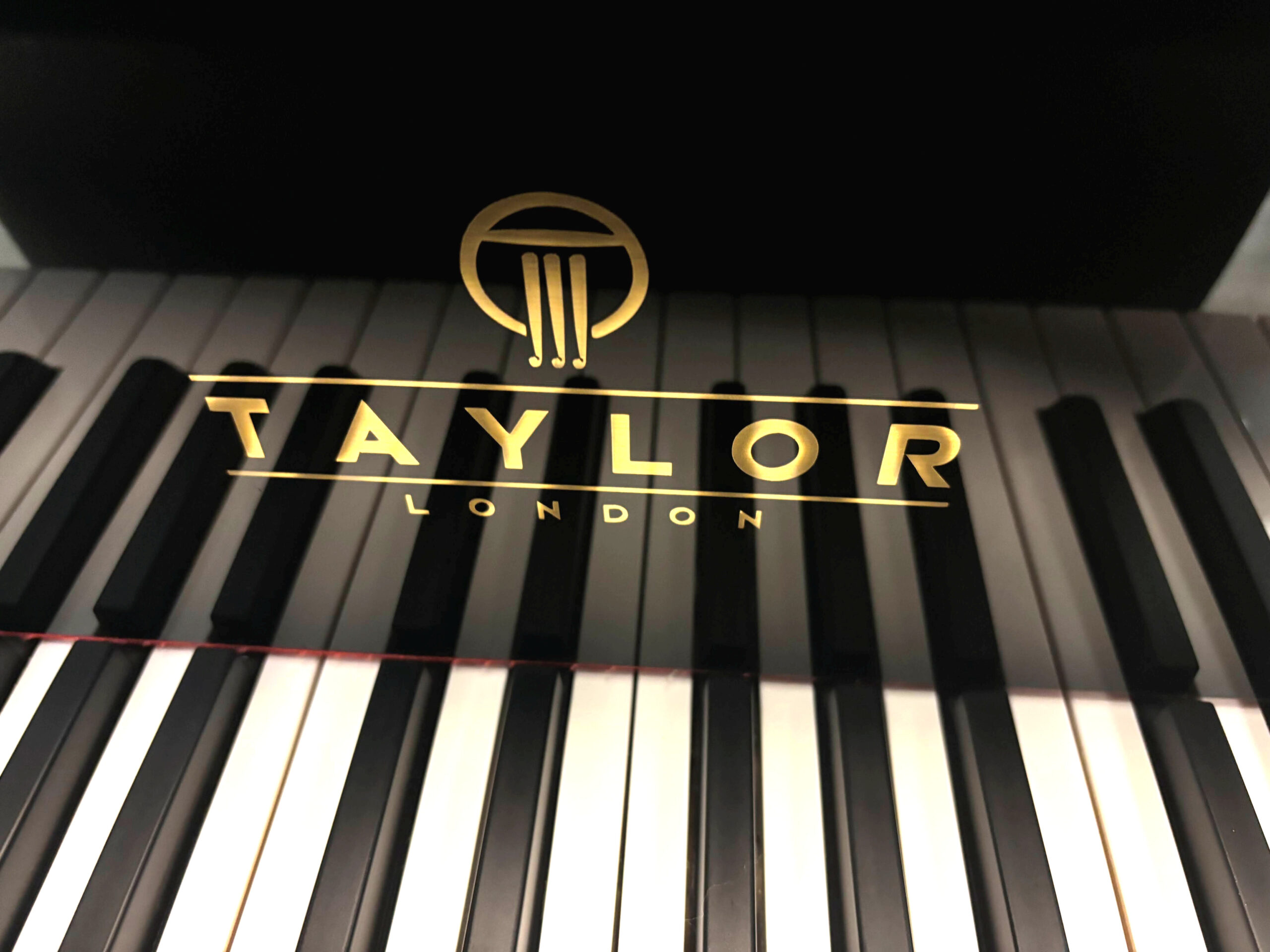 Taylor London Piano History - Houston Piano Company